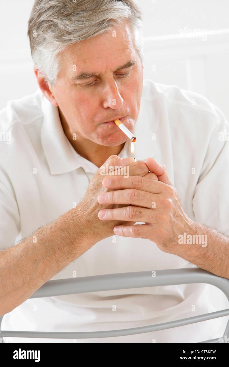 ELDERLY PERSON SMOKING Stock Photo - Alamy
