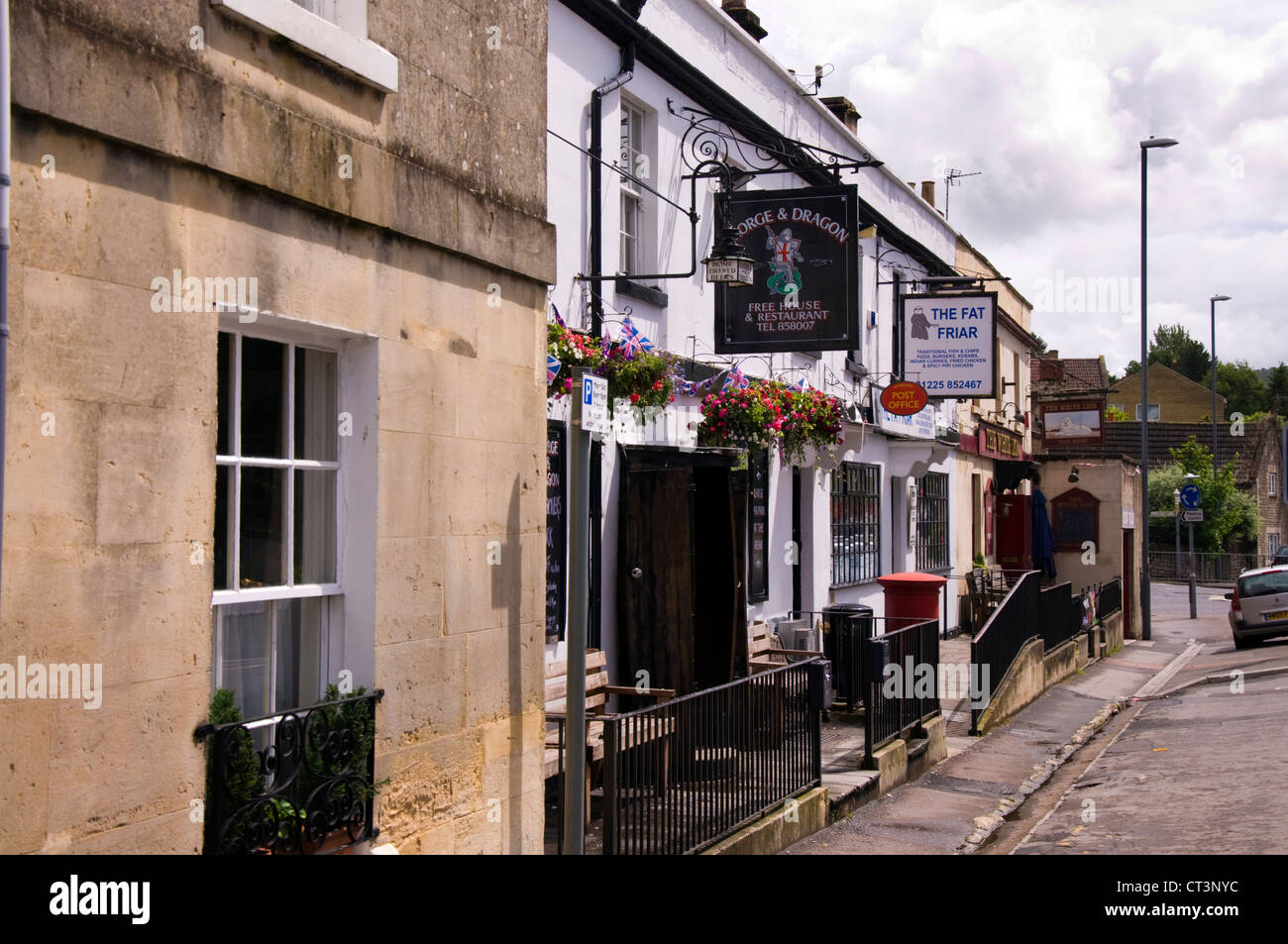 Parade of shops in Batheaston George and Dragon pub Stock Photo - Alamy