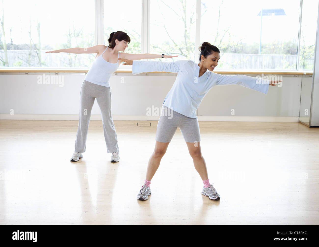 Women stretching in gym Stock Photo - Alamy