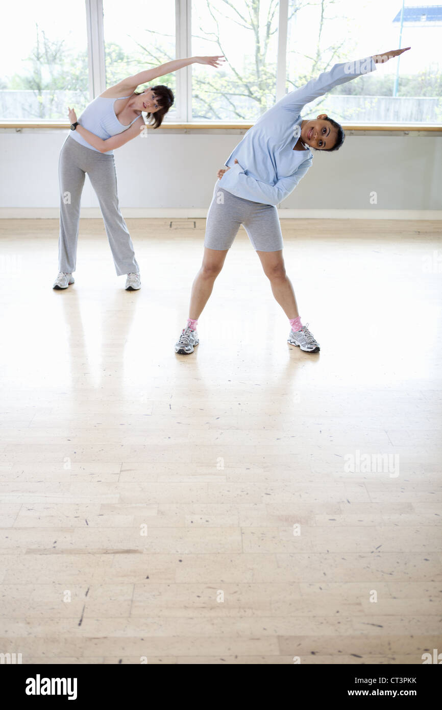 Women stretching in gym Stock Photo - Alamy