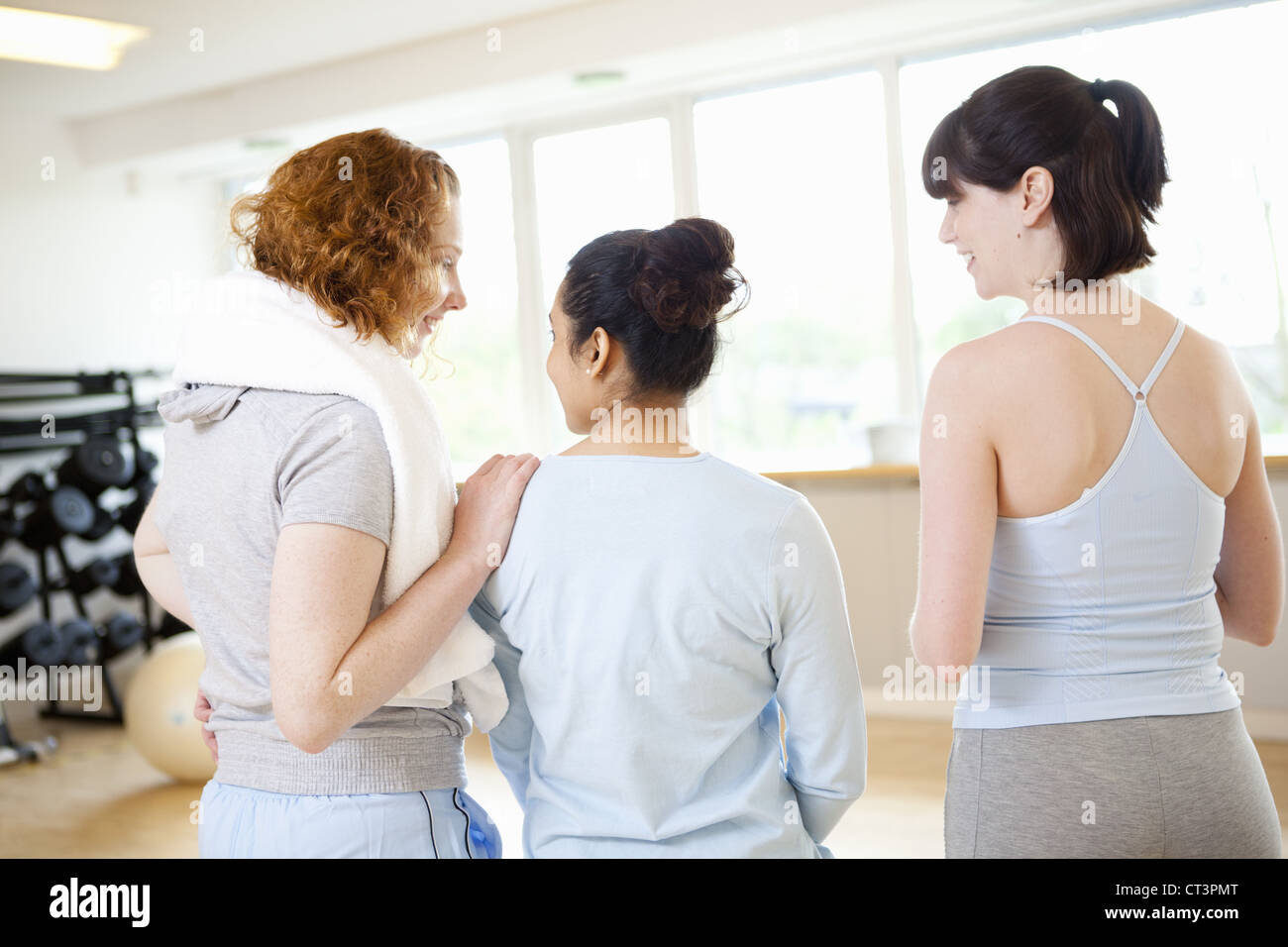 Women talking in gym Stock Photo - Alamy