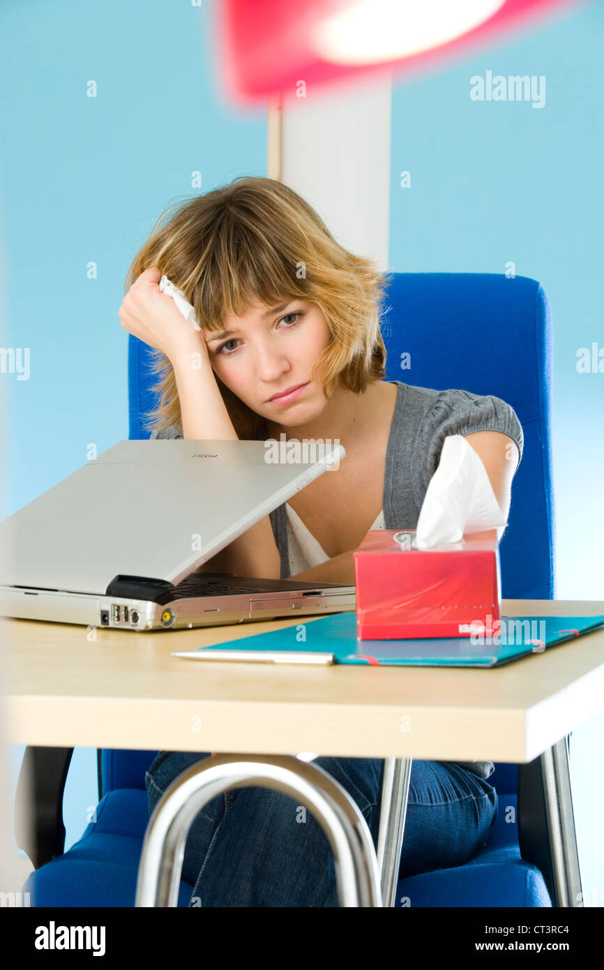 Crying woman seated hi-res stock photography and images - Alamy