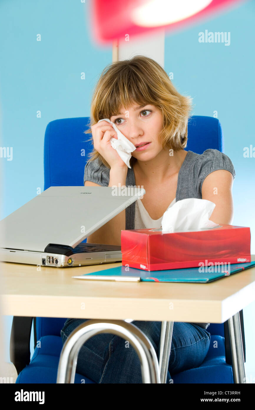 Crying woman seated hi-res stock photography and images - Alamy