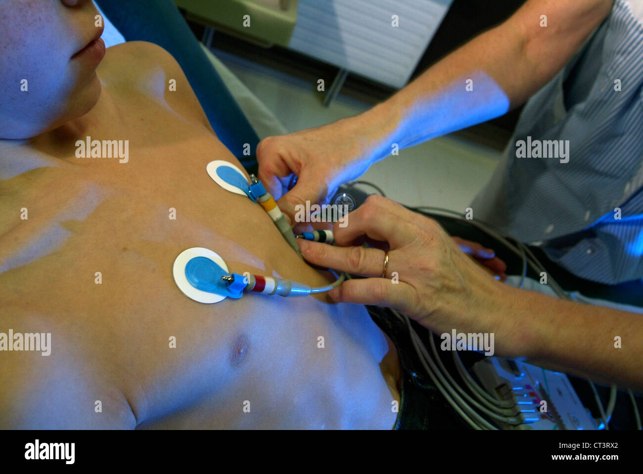 Male Patient Undergoes Ecg Electrocardiogram Stock Photos & Male ...
