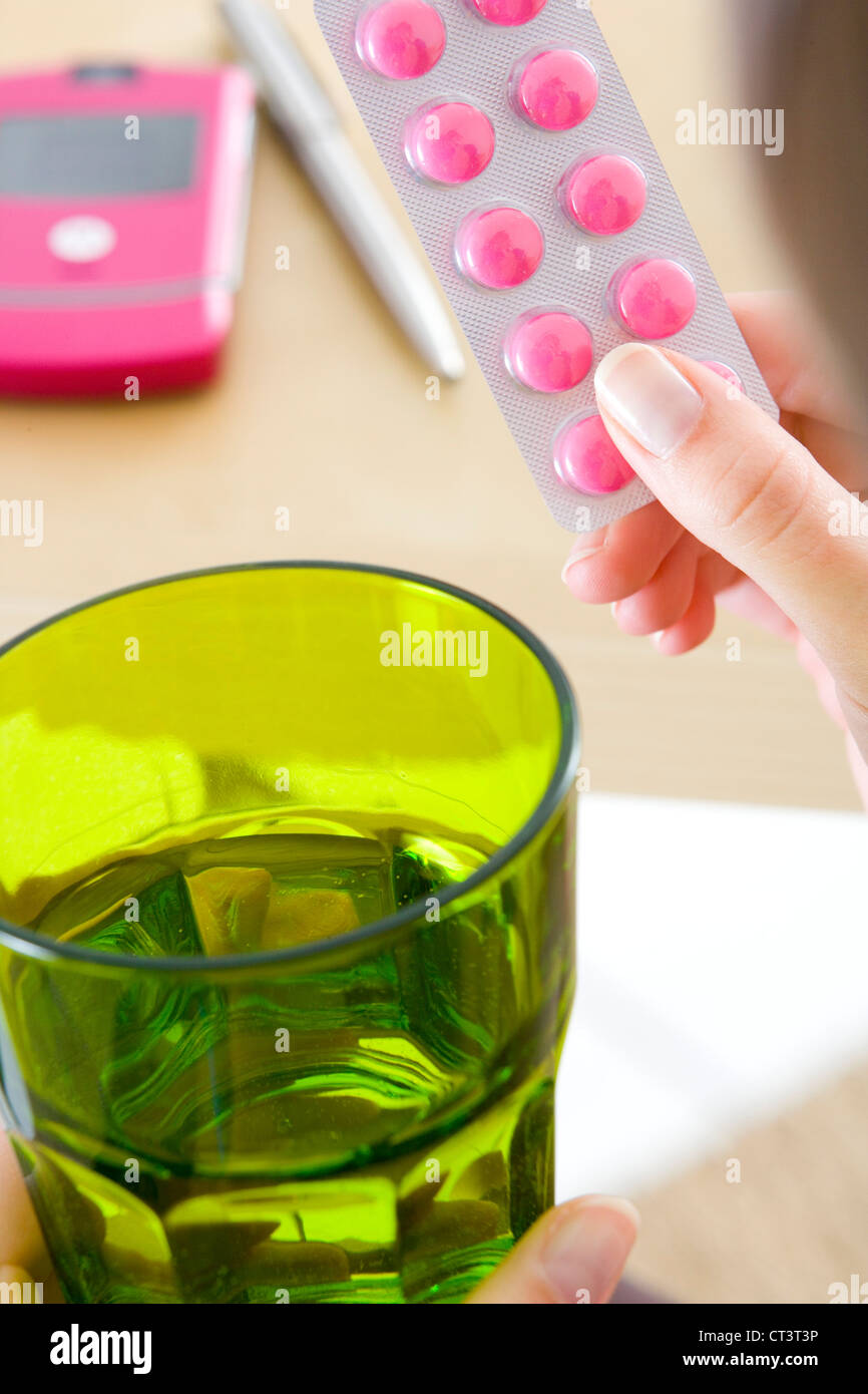 Medication women hi-res stock photography and images - Alamy