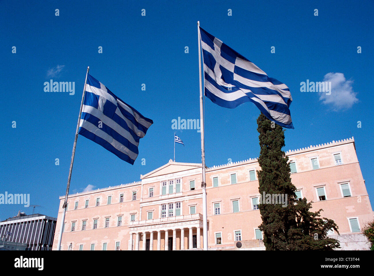 Athens, Greek national flag at the Athens Parliament Stock Photo - Alamy