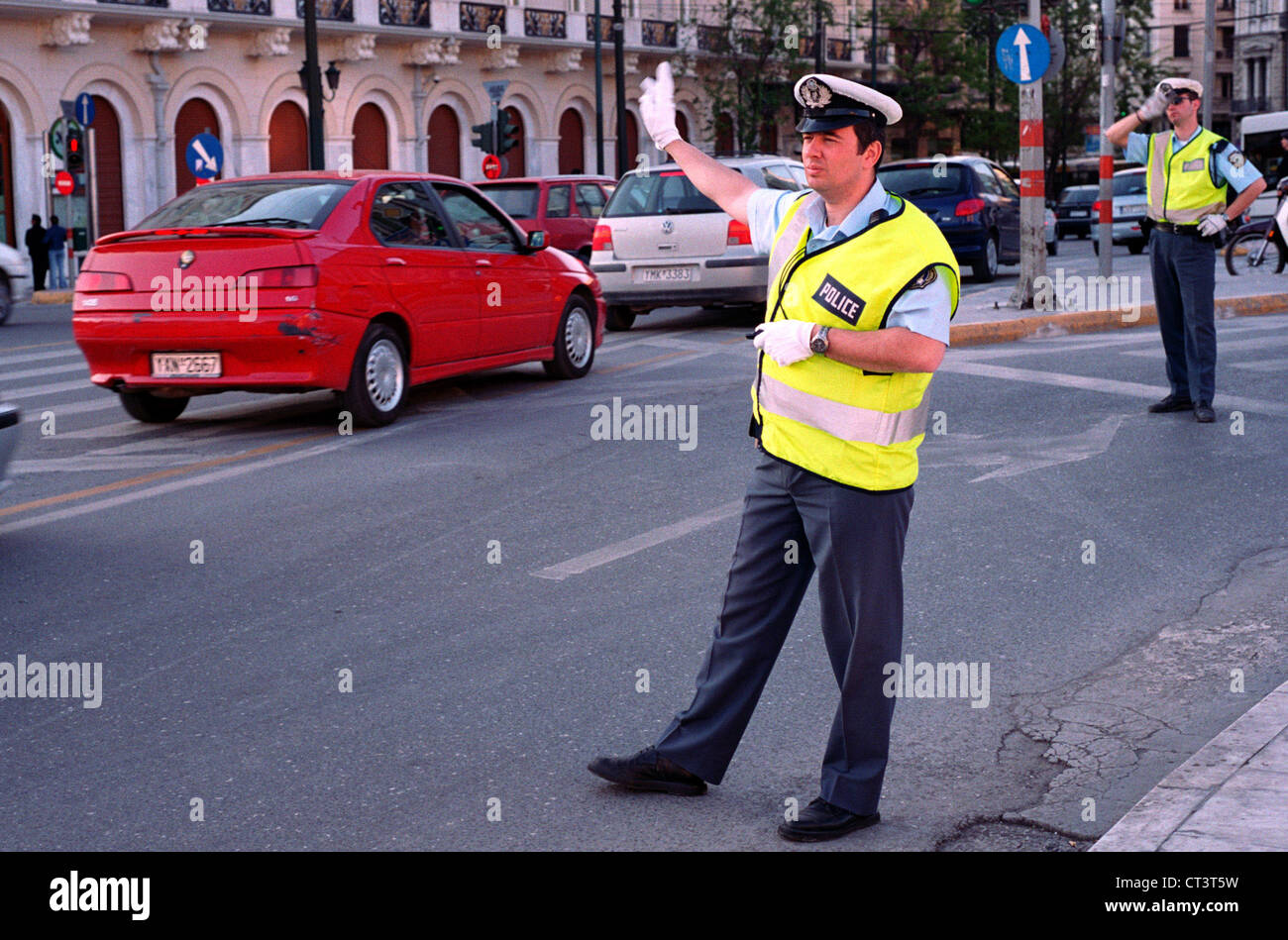 Policeman hand signals hi-res stock photography and images - Alamy