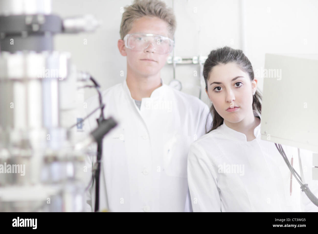 Scientists standing in lab Stock Photo - Alamy