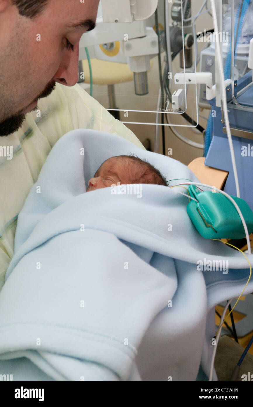 FATHER AND PREMATURE BABY Stock Photo - Alamy