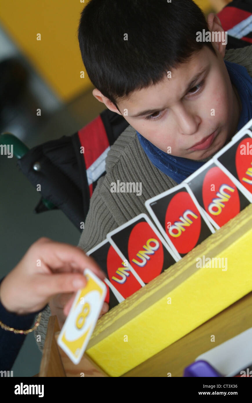 Disabled child playing board games hi-res stock photography and images ...