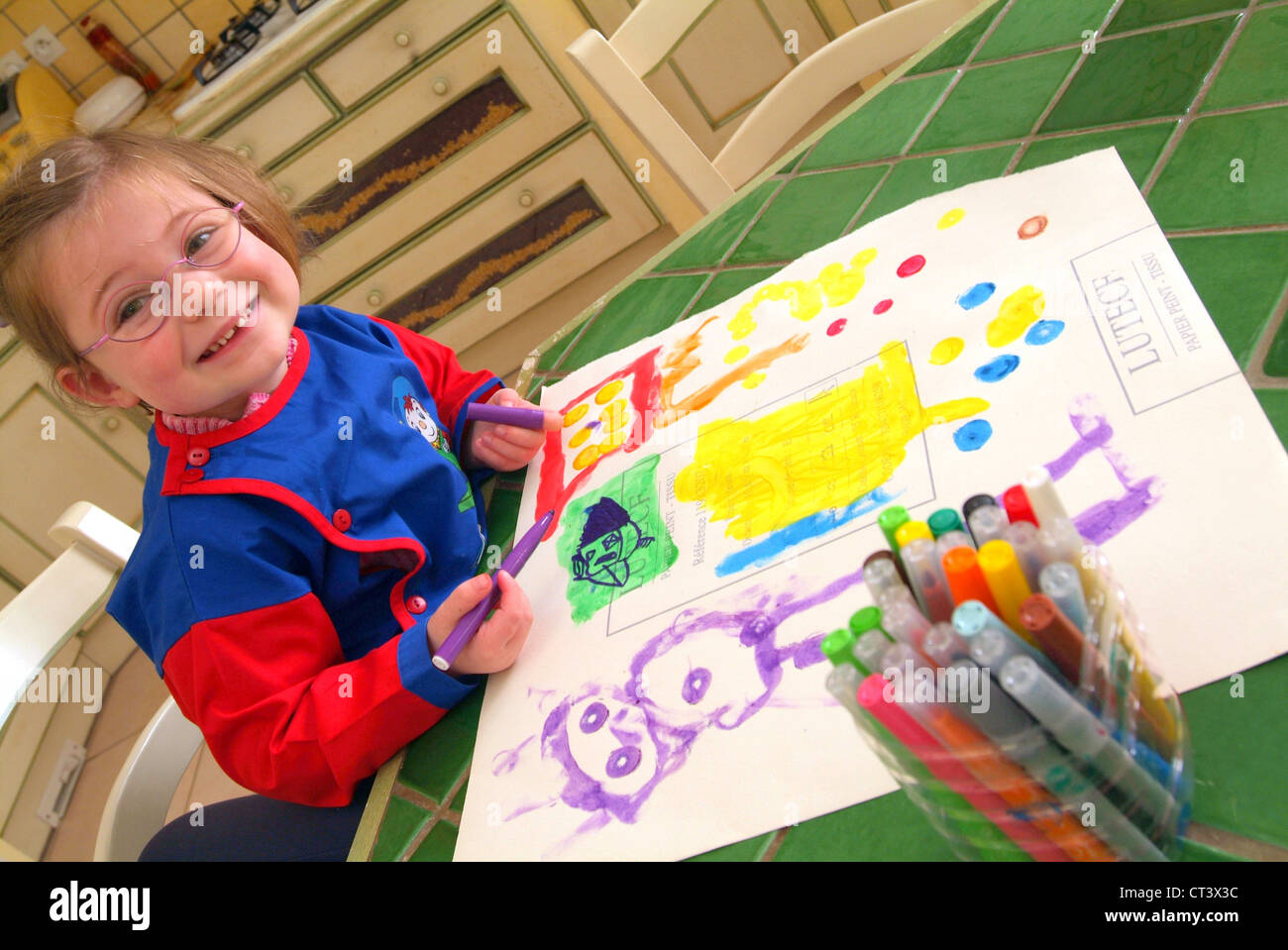 CHILD DRAWING INDOORS Stock Photo - Alamy