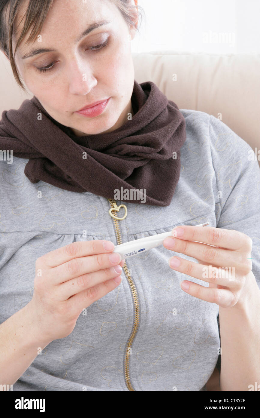 WOMAN WITH FEVER Stock Photo - Alamy