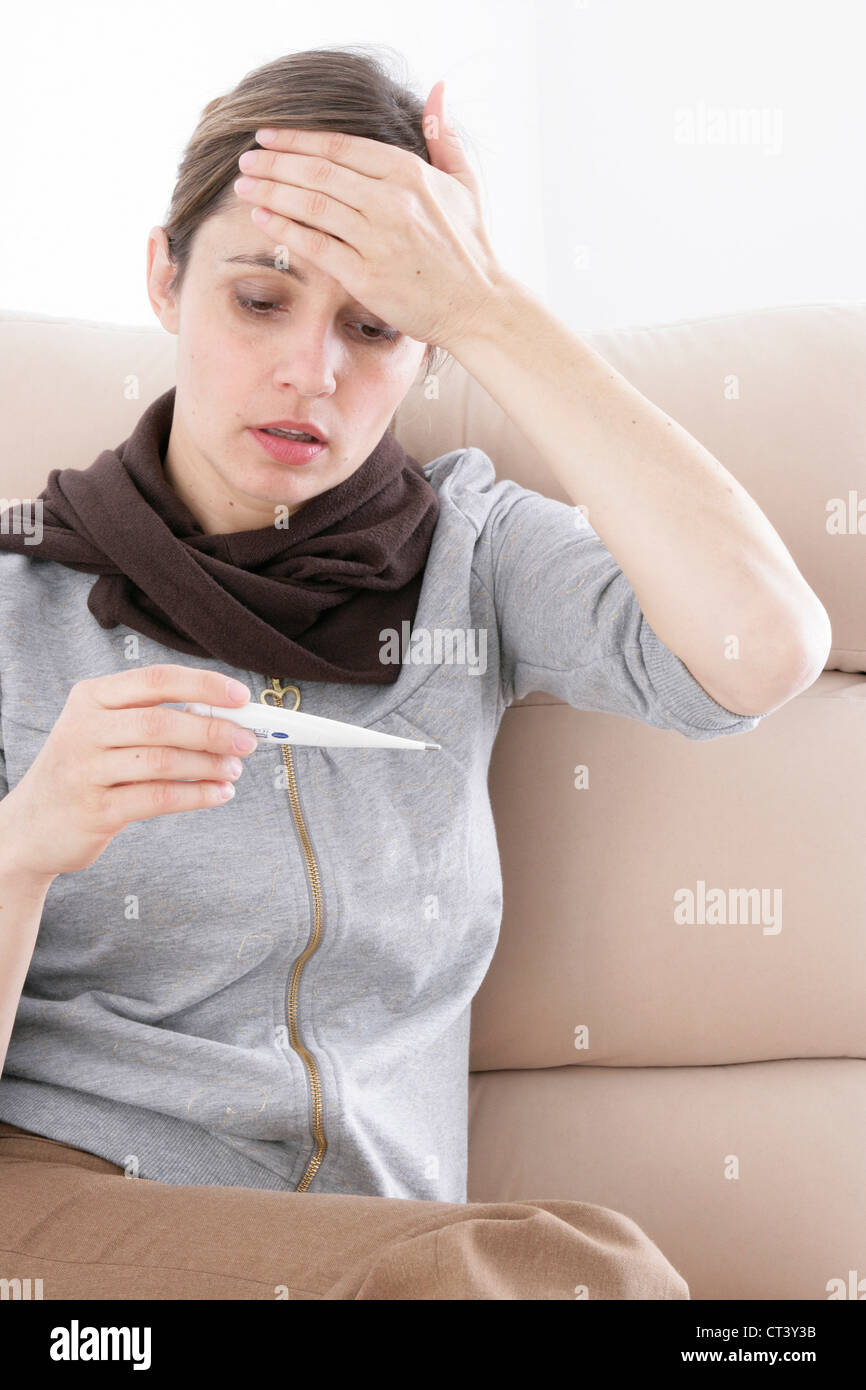 WOMAN WITH FEVER Stock Photo - Alamy