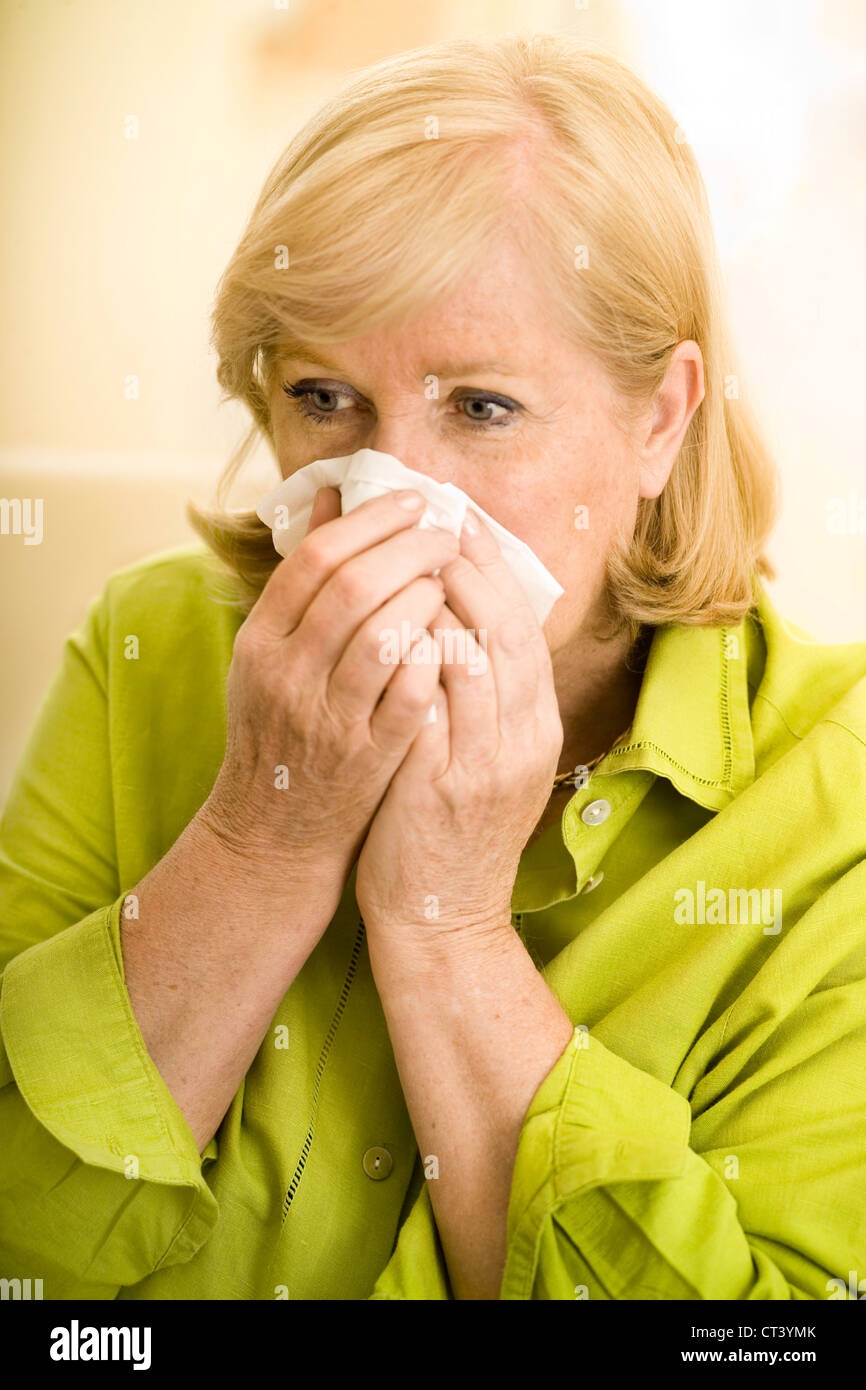 ELDERLY PERSON WITH RHINITIS Stock Photo - Alamy