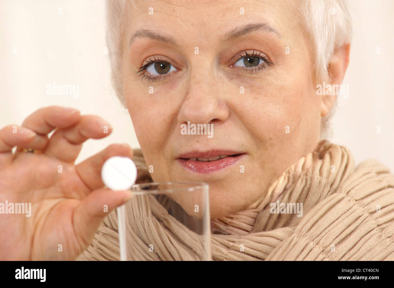 ELDERLY PERSON TAKING MEDICATION Stock Photo - Alamy