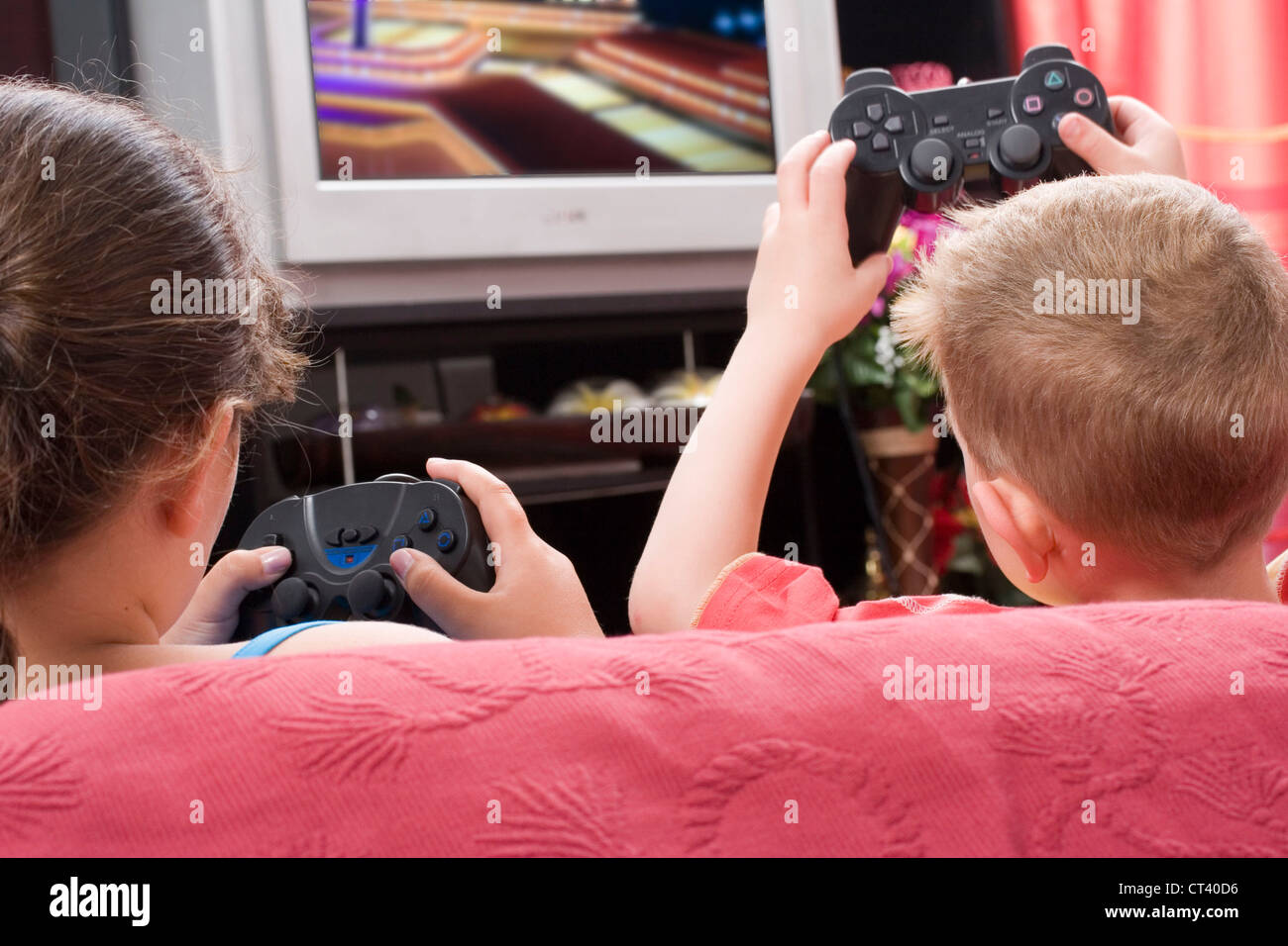 CHILD PLAYING WITH VIDEO GAME Stock Photo - Alamy