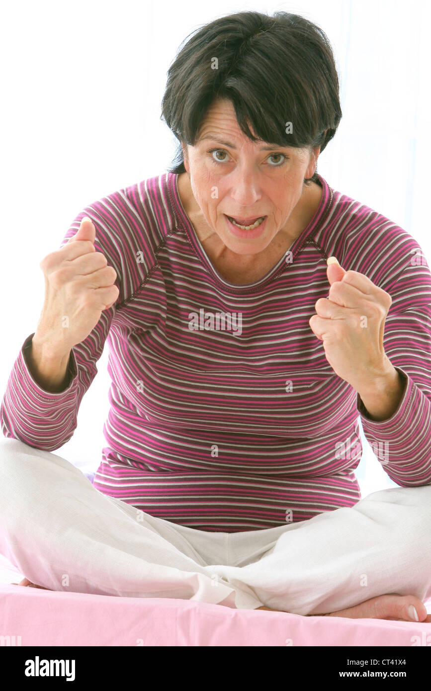 ANGRY ELDERLY WOMAN Stock Photo - Alamy