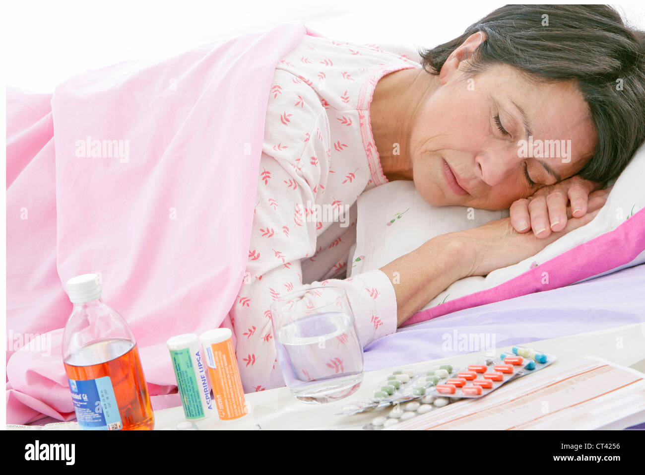 WOMAN TAKING MEDICATION Stock Photo - Alamy