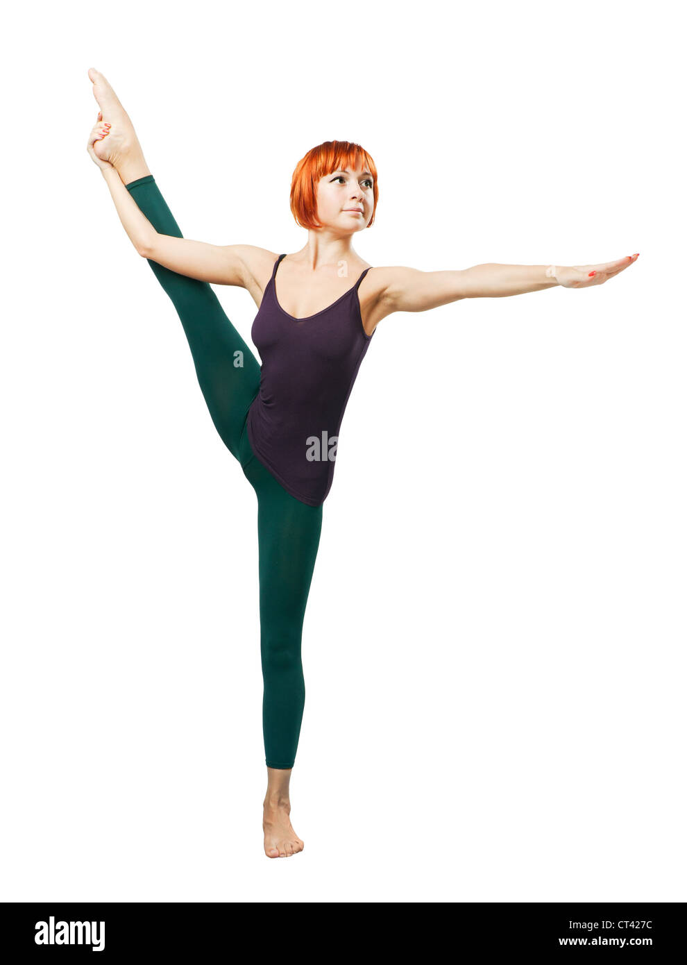 Slim beautiful woman practicing yoga asana standing on one leg Stock ...