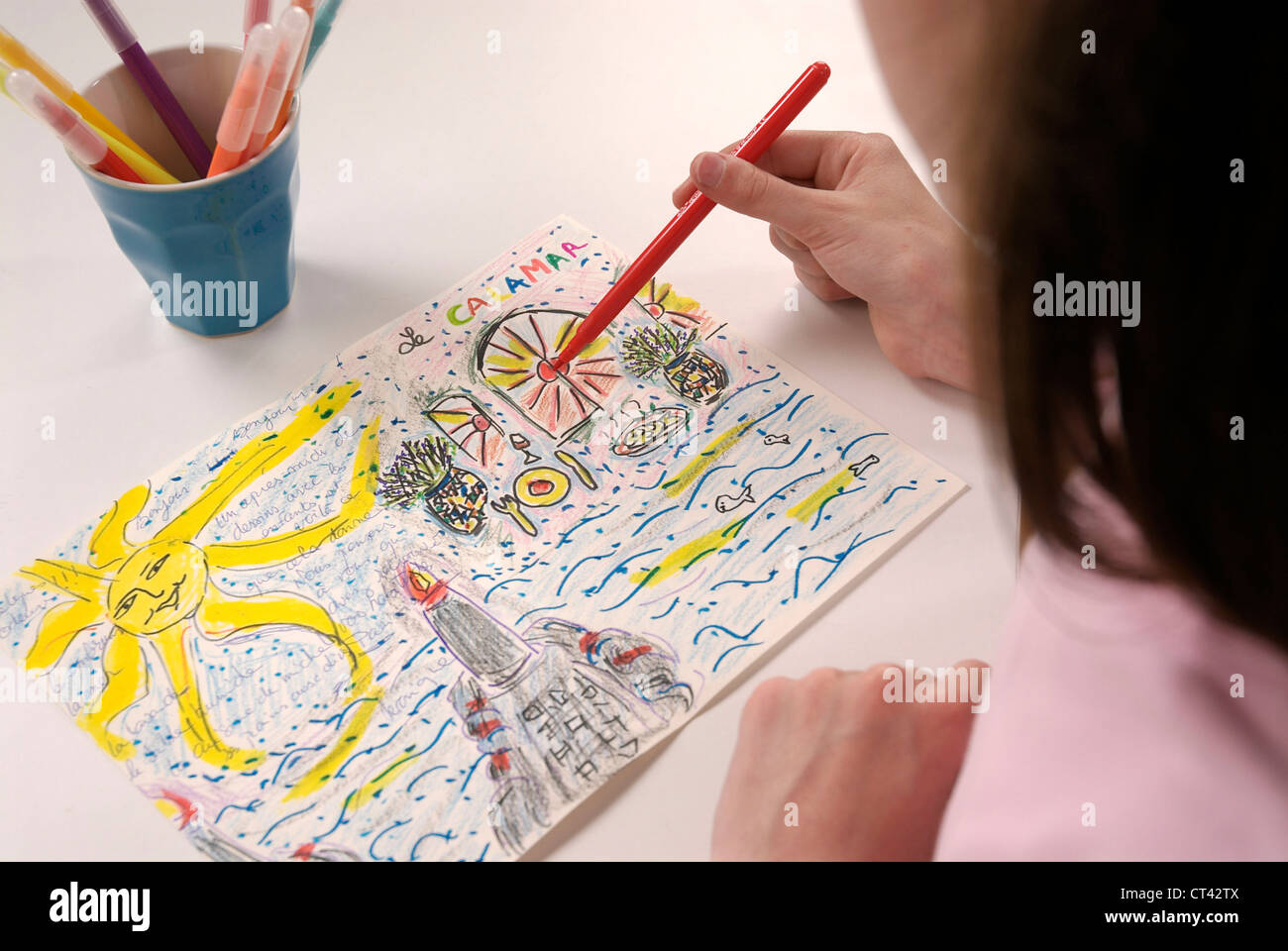 CHILD DRAWING INDOORS Stock Photo - Alamy