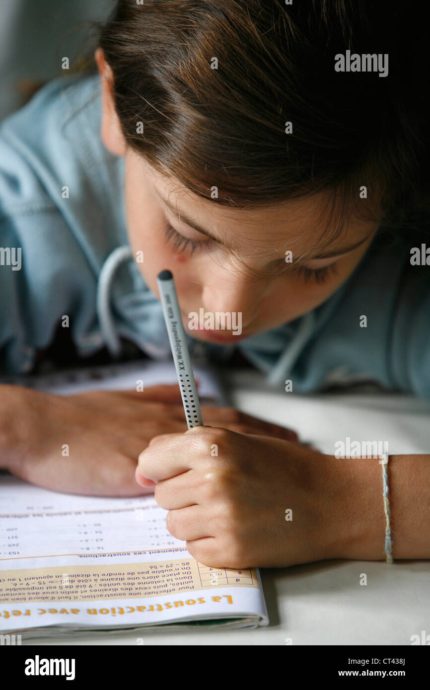 CHILD DOING HOMEWORK Stock Photo - Alamy
