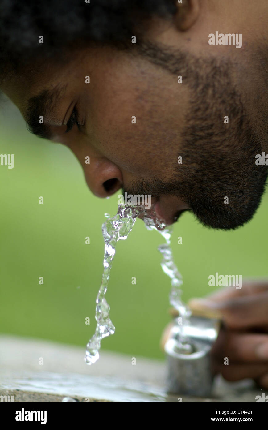Man drinks from the fountain hi-res stock photography and images - Alamy