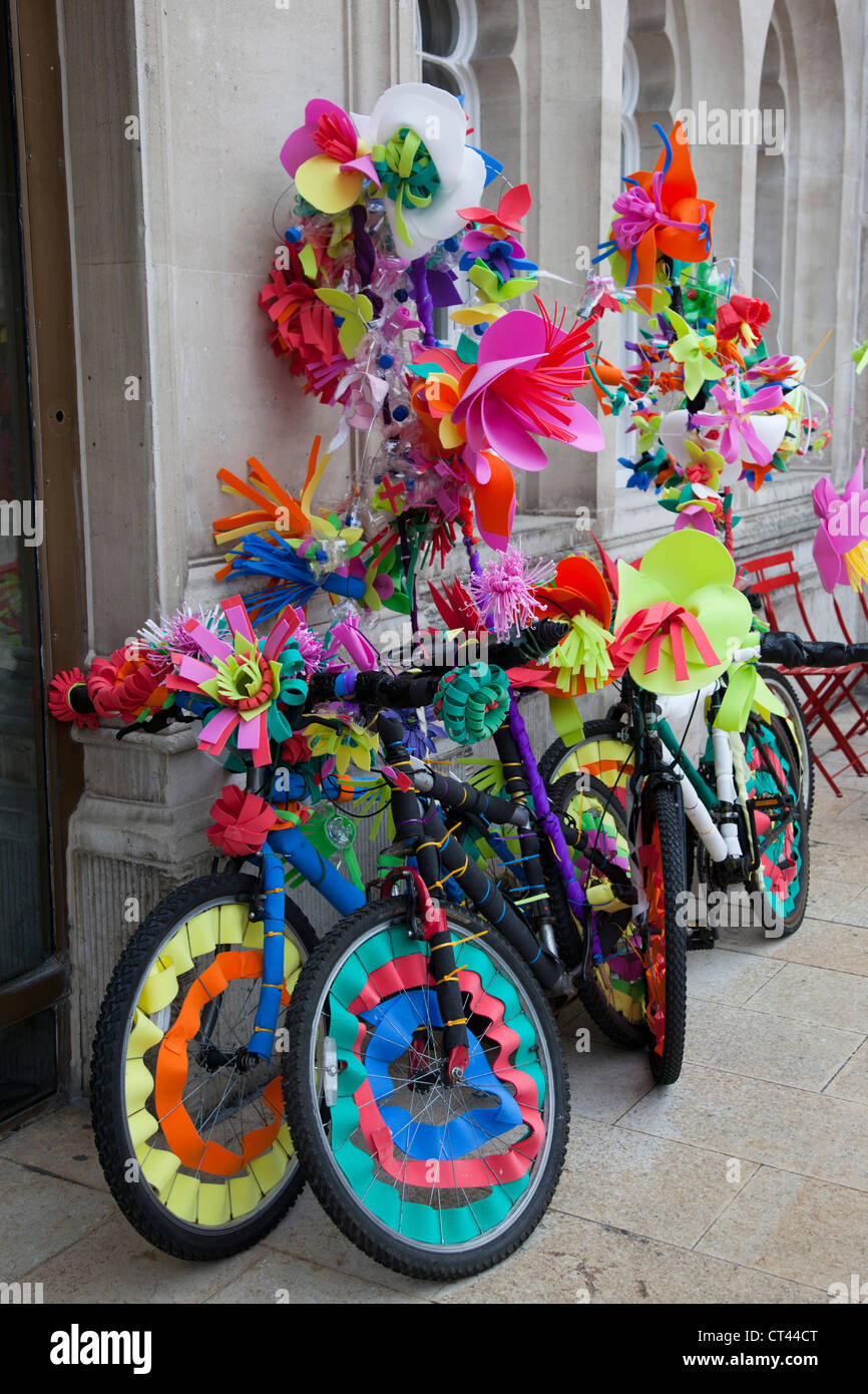 Colourfully decorated bicycles with recycled materials for the Flowers ...