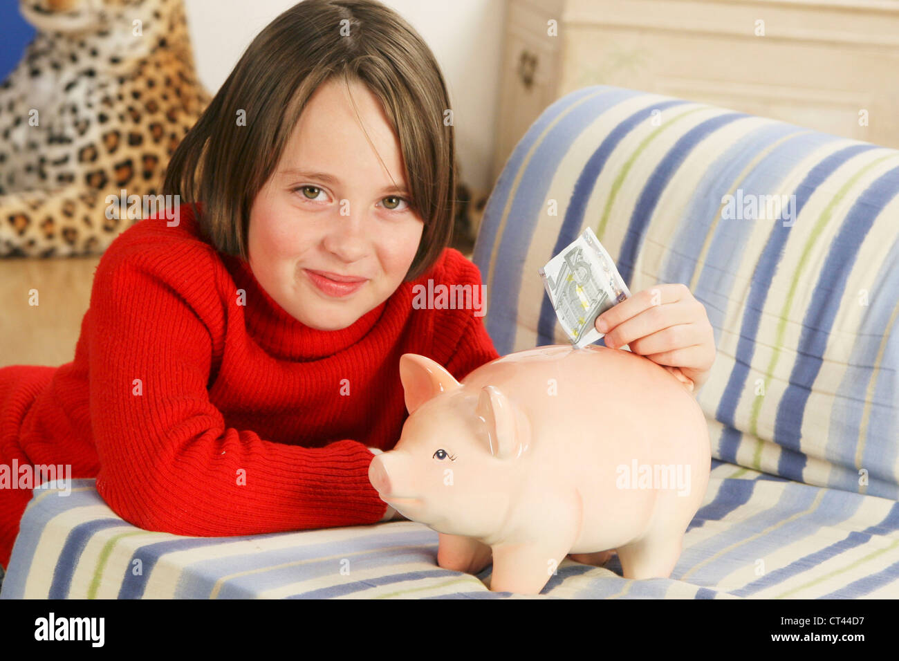 CHILD WITH MONEY Stock Photo - Alamy