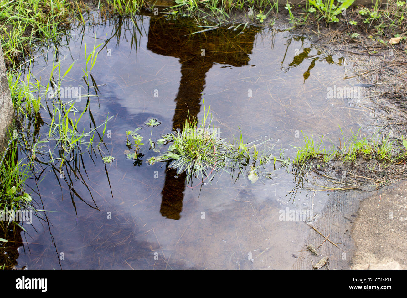 reflection of cross monument in water Stock Photo - Alamy