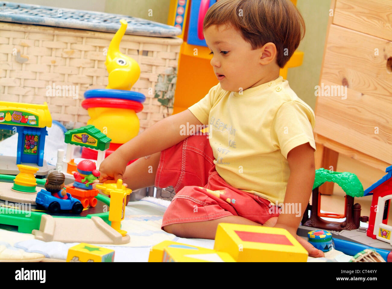 CHILD PLAYING INDOORS Stock Photo - Alamy