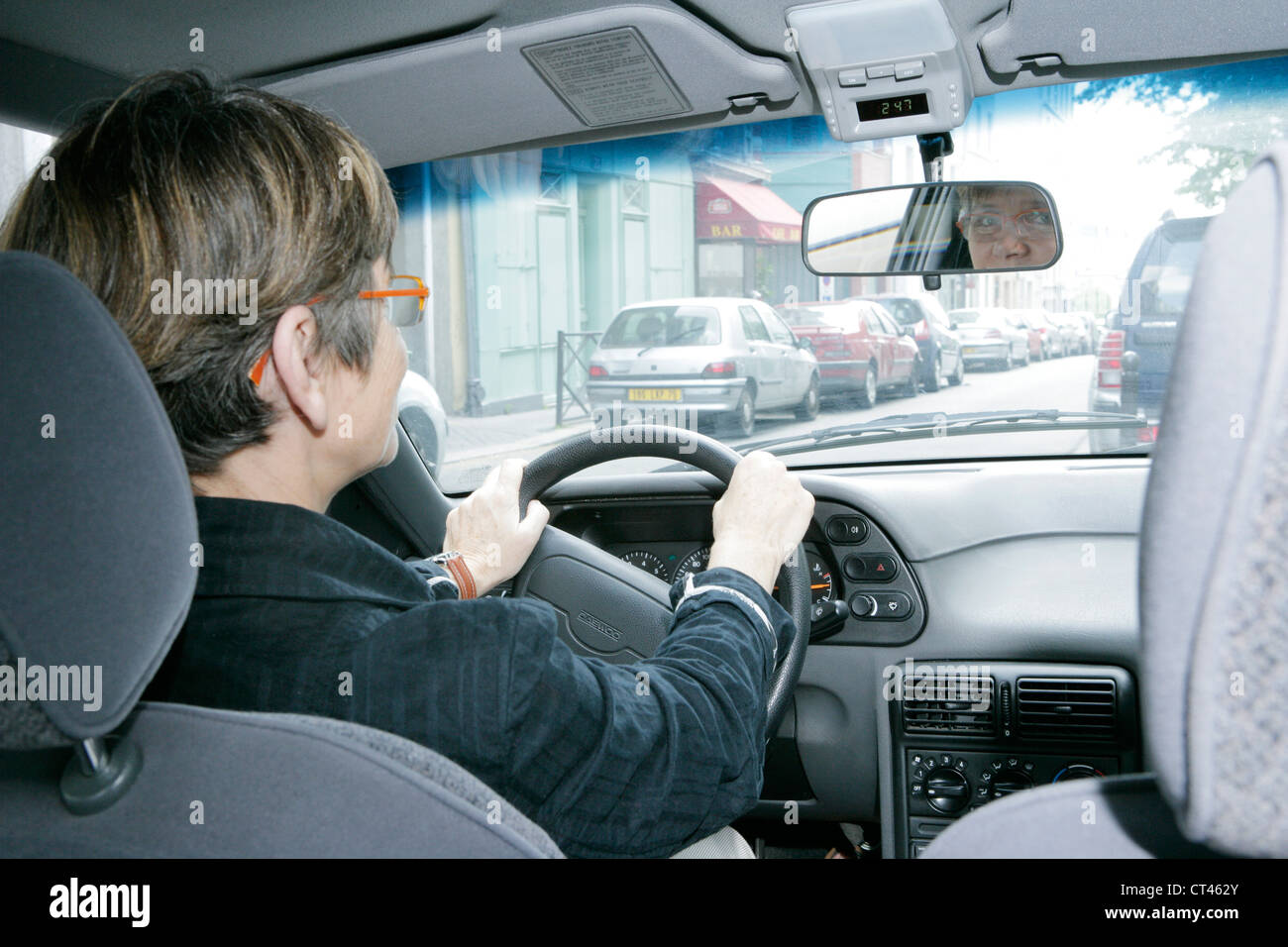 Elderly woman driver steering wheel hi-res stock photography and images ...