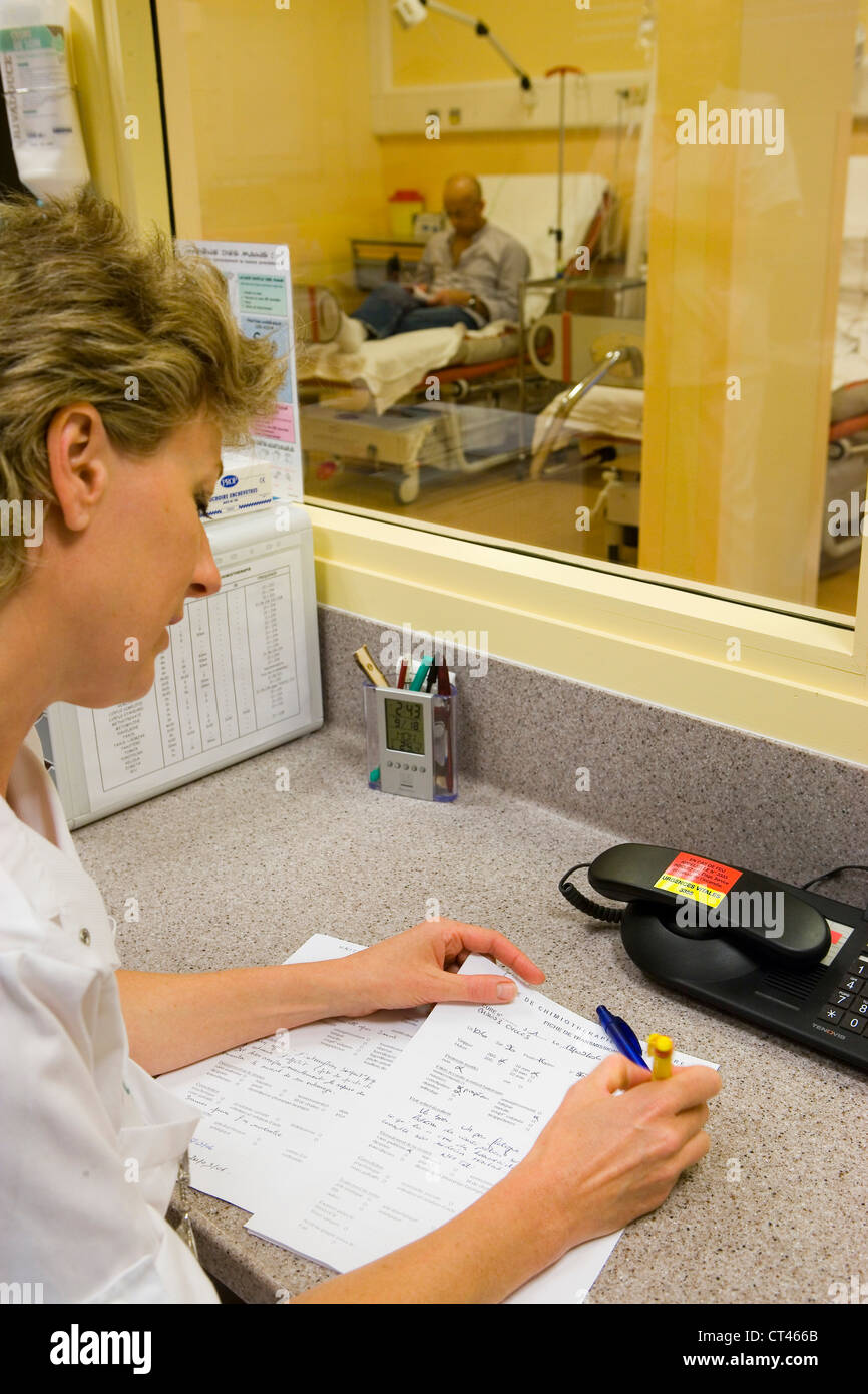 NURSE WITH PATIENT'S RECORD Stock Photo - Alamy