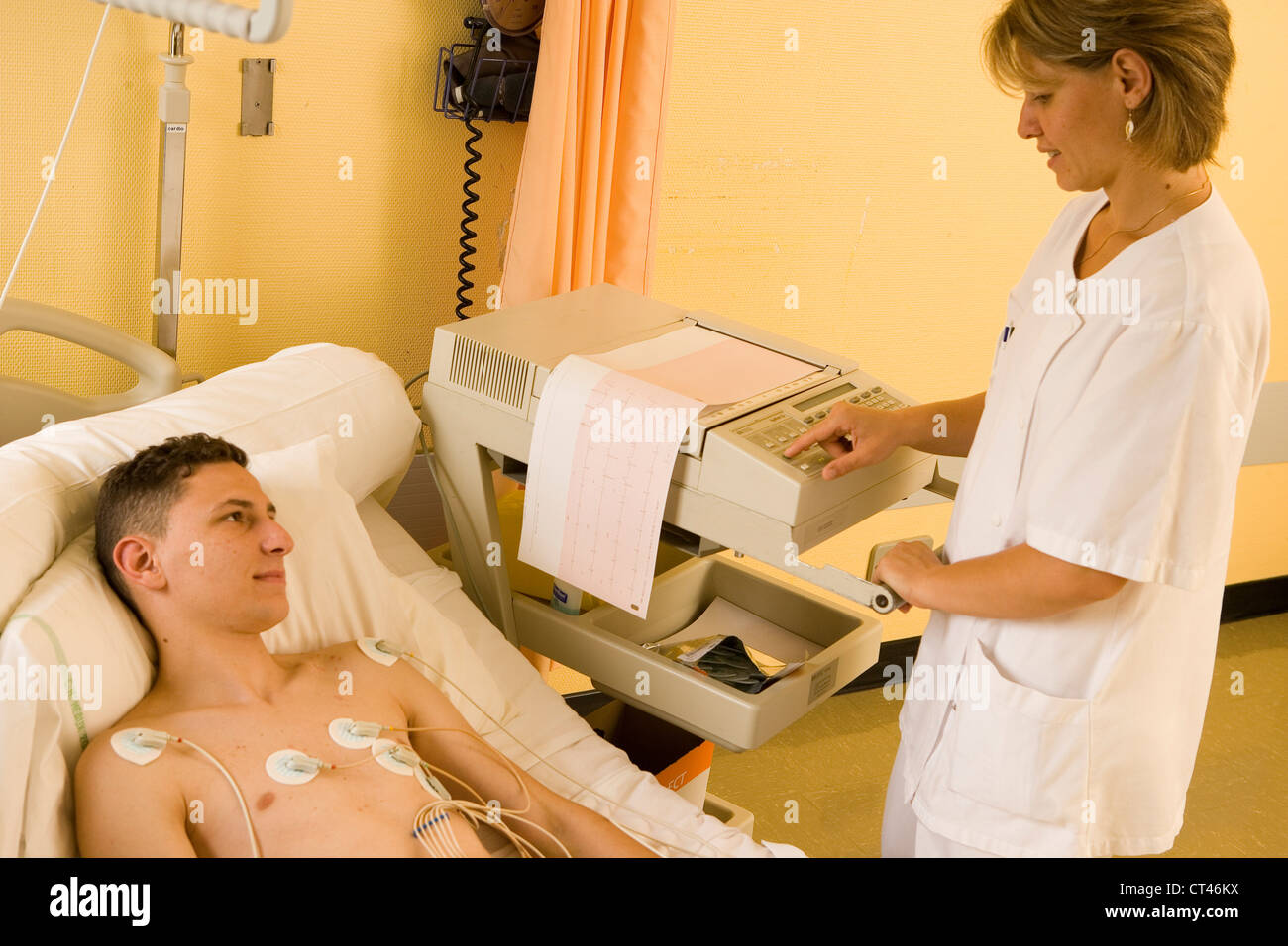 Hospital patient undergoing electrocardiogram hi-res stock photography ...