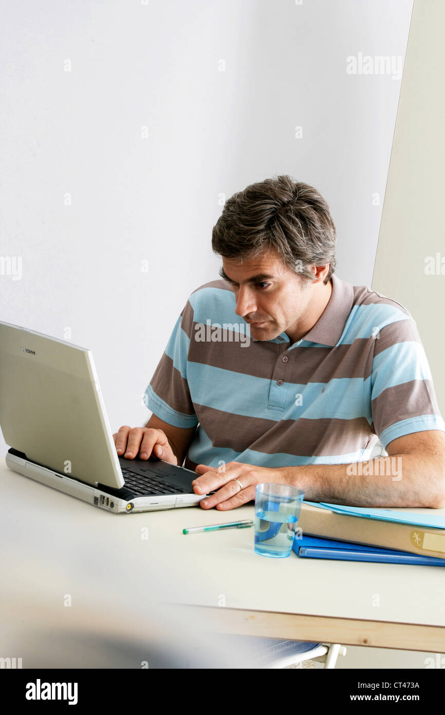 Humans using technology hi-res stock photography and images - Alamy