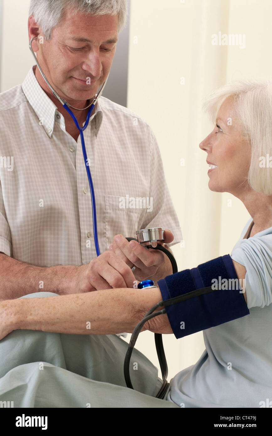 BLOOD PRESSURE, ELDERLY PERSON Stock Photo - Alamy