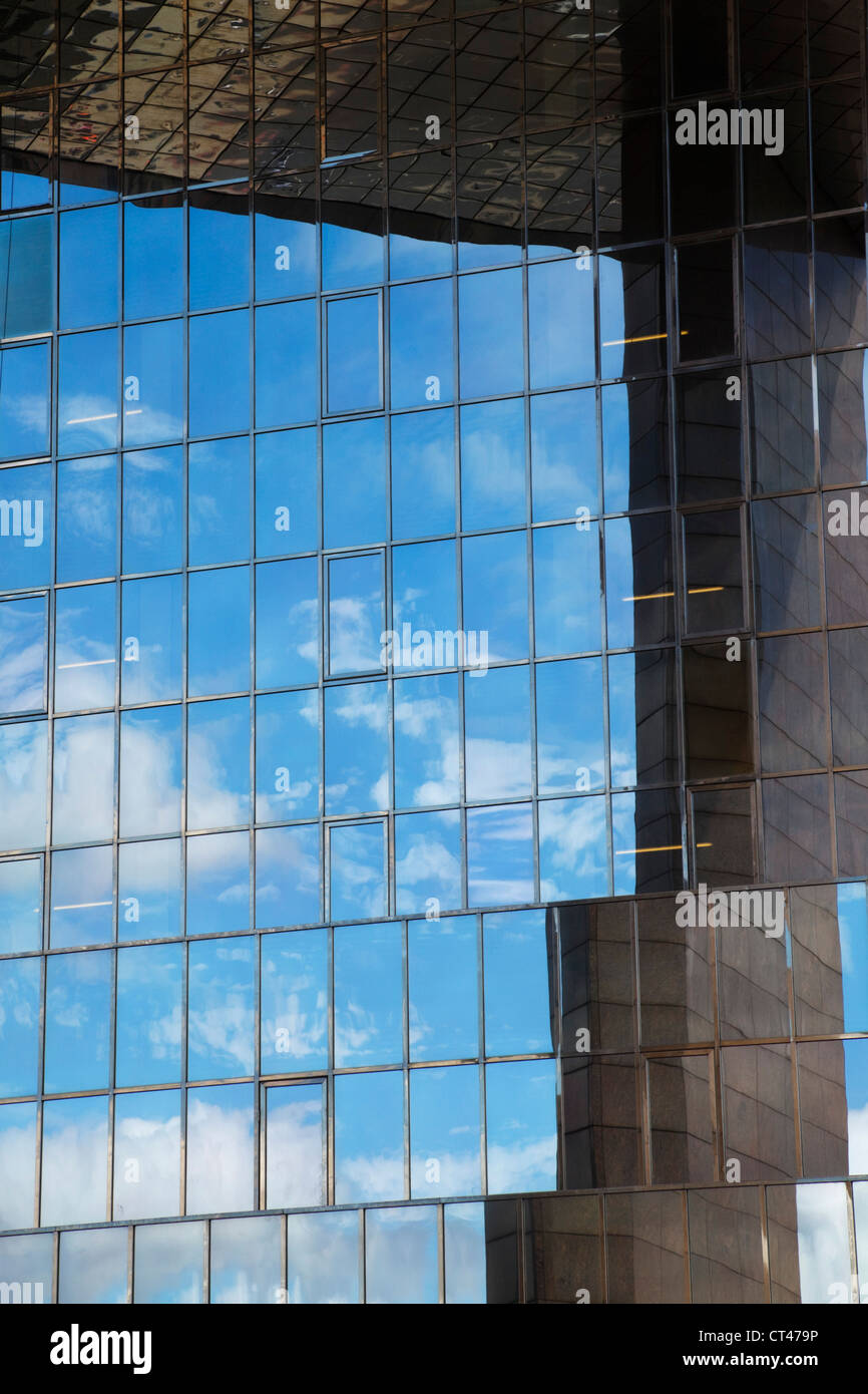 Reflections in the glass windows of No1 Tower Bridge building. London ...