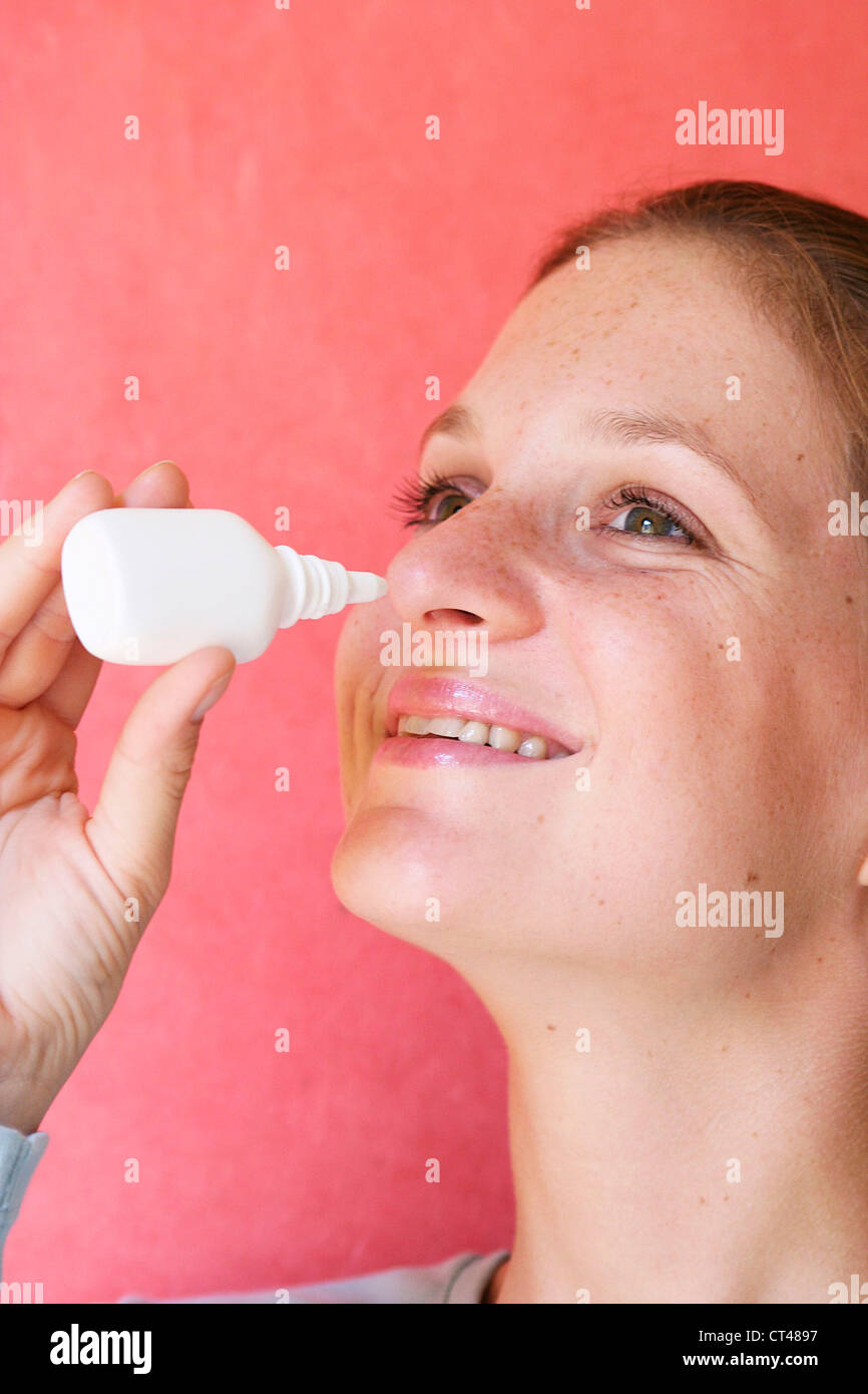 Lady ear drops hi-res stock photography and images - Alamy