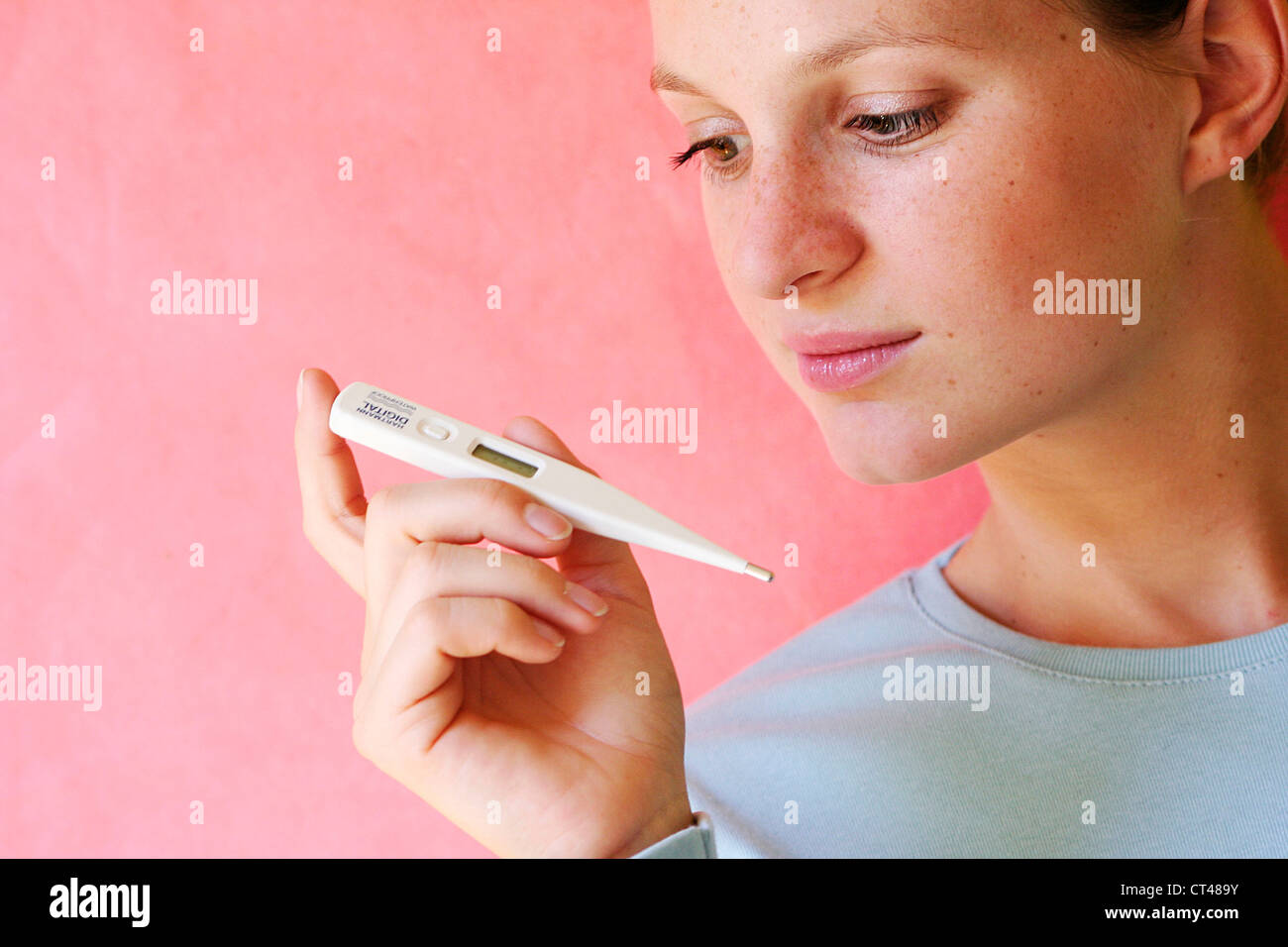 WOMAN WITH FEVER Stock Photo - Alamy
