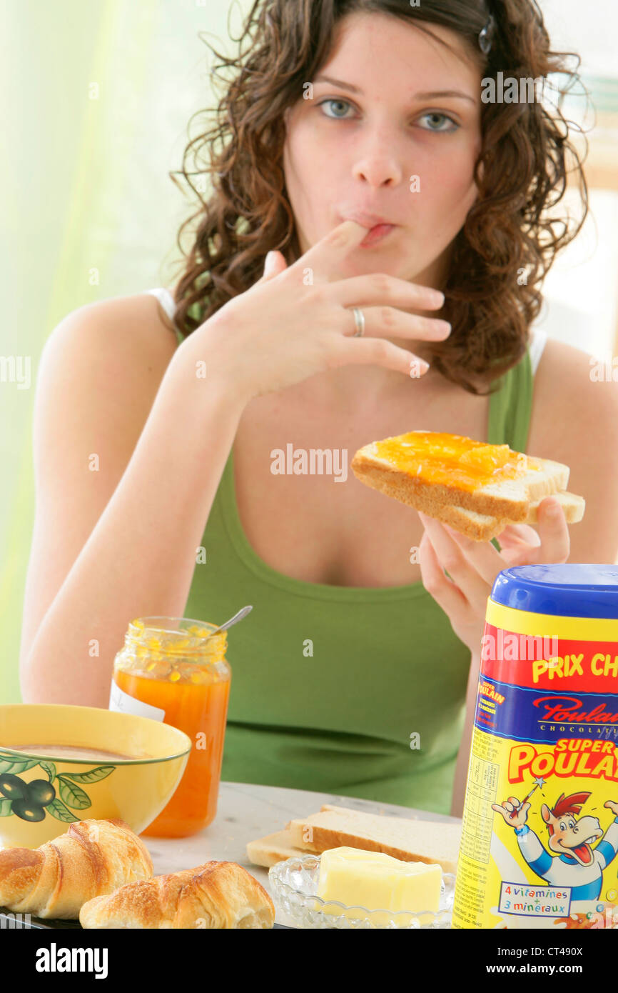 ADOLESCENT EATING BREAKFAST Stock Photo - Alamy