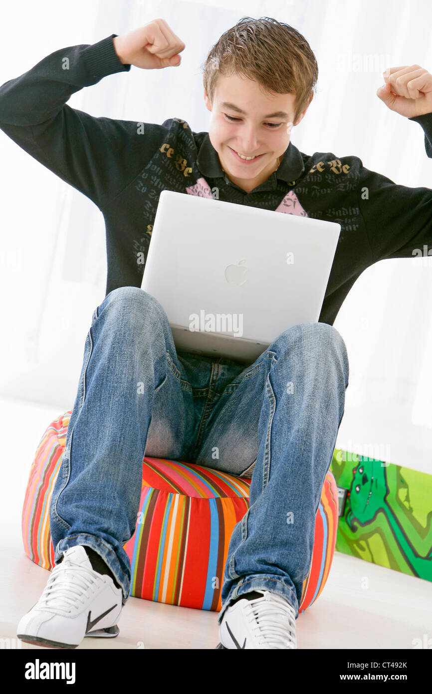 TEENAGER AT A COMPUTER Stock Photo - Alamy