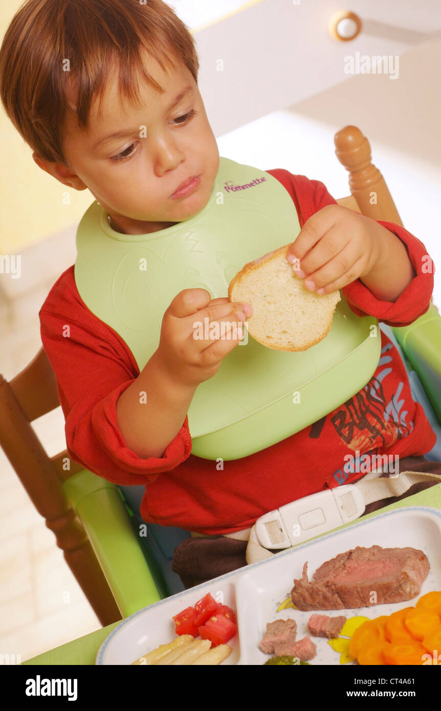 Child eating starchy food hi-res stock photography and images - Alamy