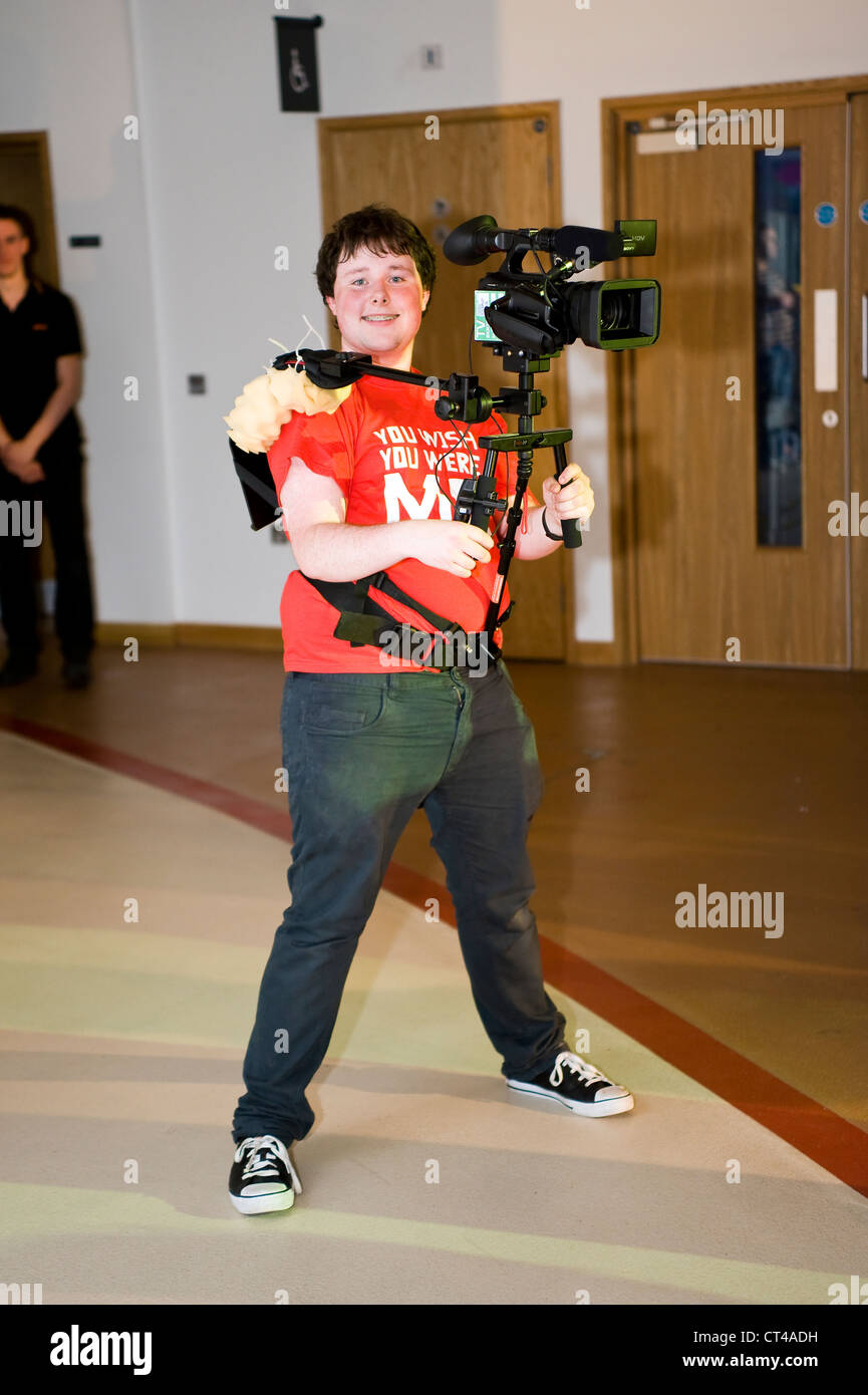 Student using a video camera Stock Photo - Alamy
