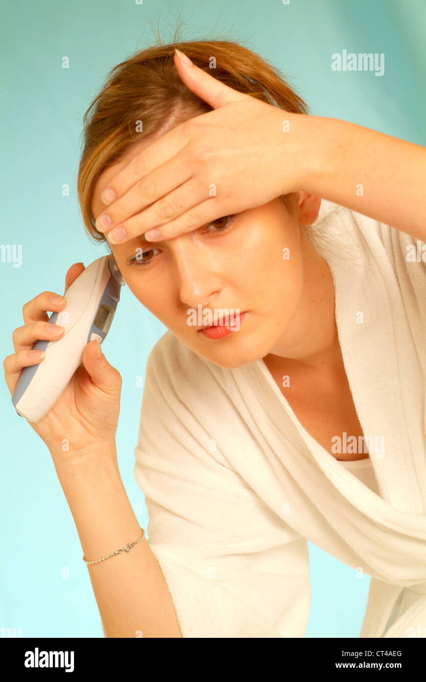 WOMAN WITH FEVER Stock Photo - Alamy