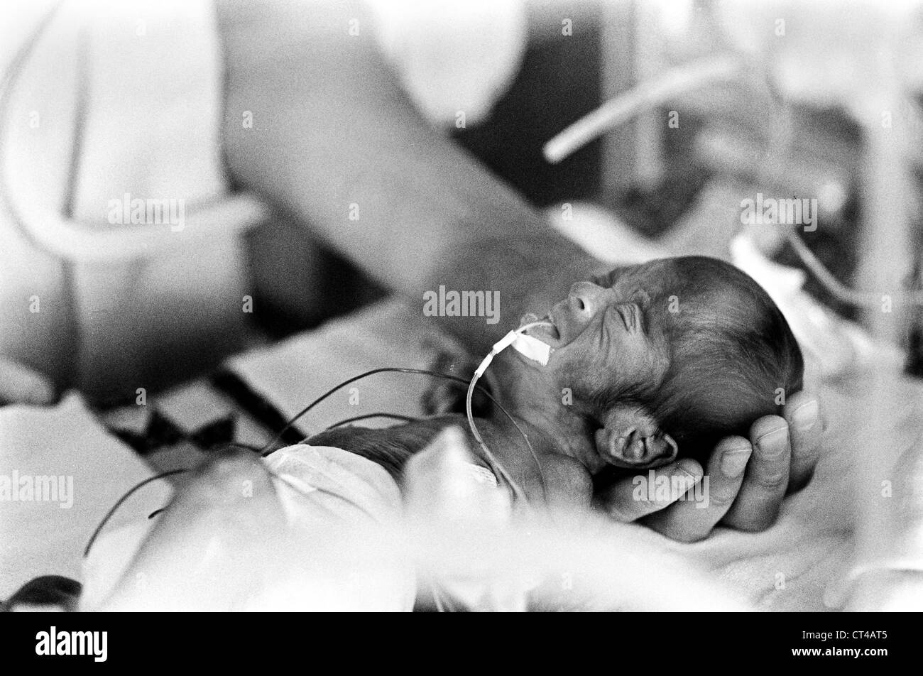 Premature baby parents Black and White Stock Photos & Images - Alamy