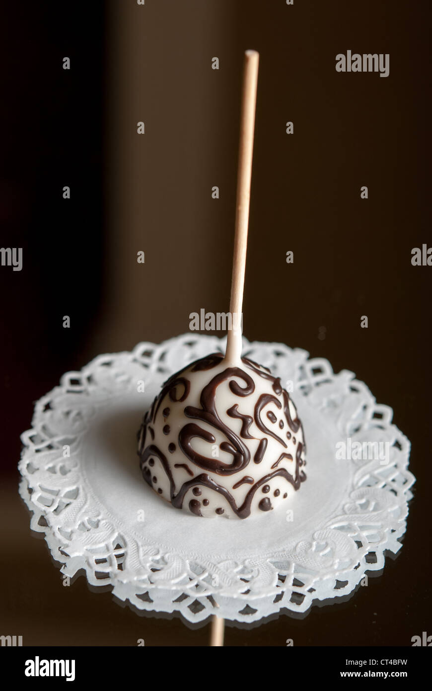 Luxury handmade white chocolate candy with stick Stock Photo - Alamy