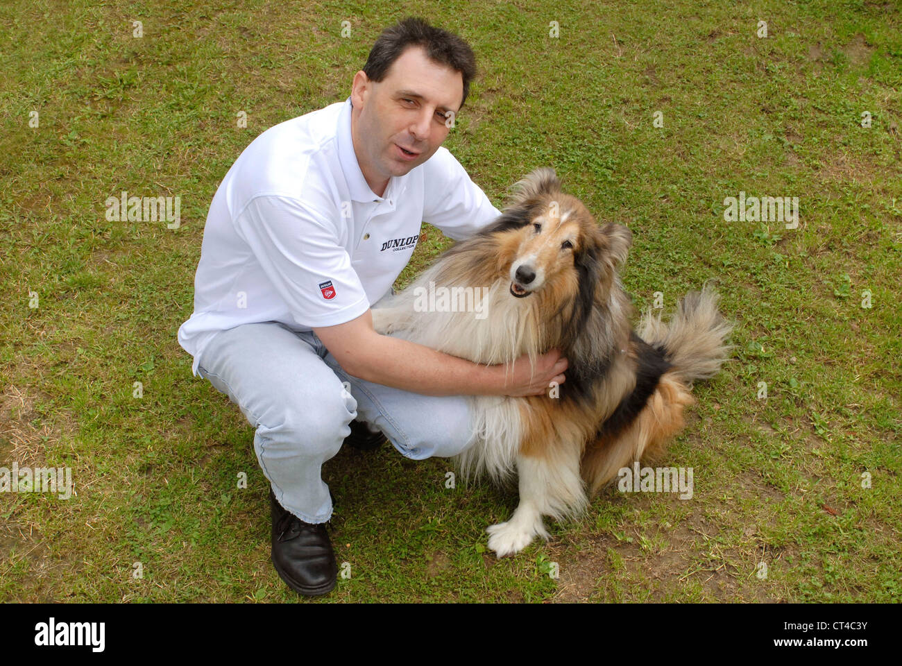 MAN WITH ANIMAL Stock Photo - Alamy