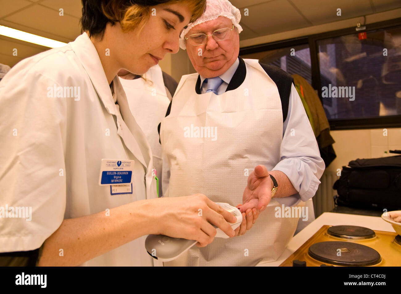 TEST FOR DIABETES ELDERLY PERSON Stock Photo - Alamy