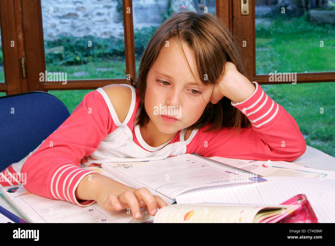 10 year old boy sitting down hi-res stock photography and images - Alamy