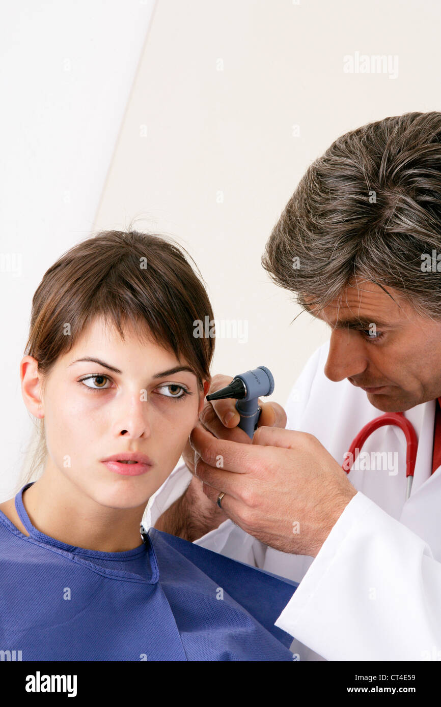Nose and throat examination otoscope hi-res stock photography and ...