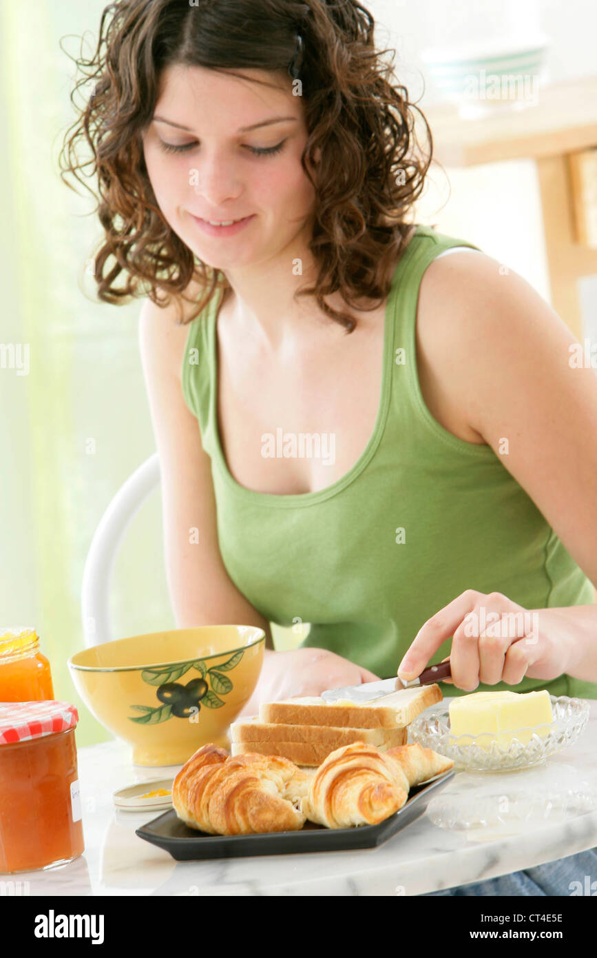 ADOLESCENT EATING BREAKFAST Stock Photo - Alamy